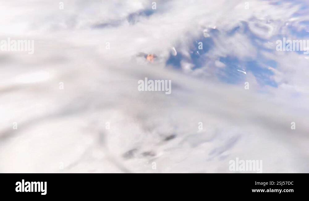 SLOW MOTION POV: Backhand surfer rides a wave at Costa da Caparica in ...