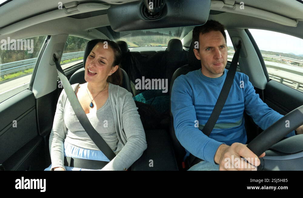 DASHCAM: Singing young couple enjoys listening new song while driving ...