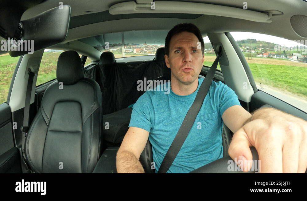 DASHCAM: Singing and dancing young man at driving a car through ...