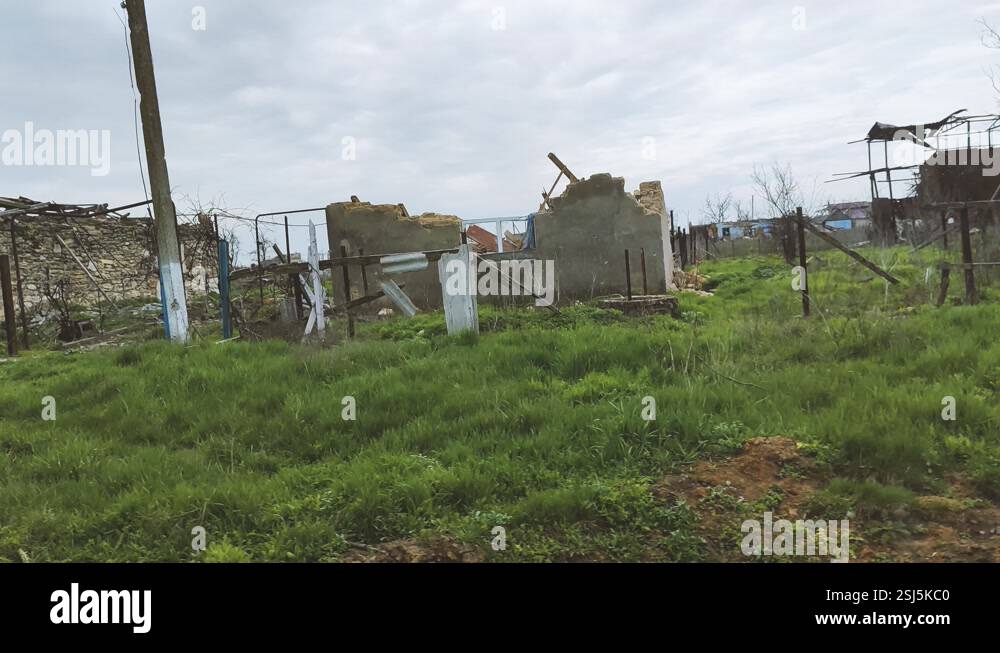 War crime. Civil houses shot down by tanks and destroyed by artillery ...