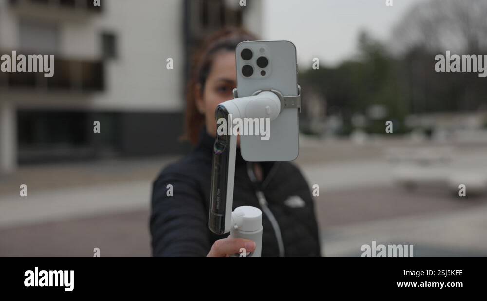 Close-up of Caucasian woman using insta360 flow smartphone gimbal Stock ...