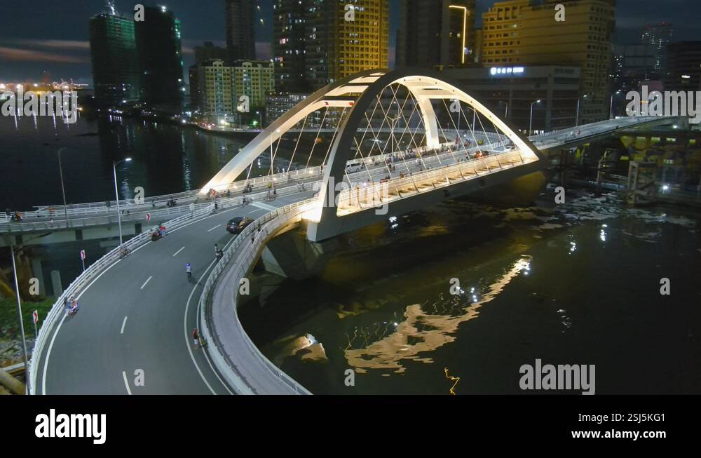Binondo–Intramuros Bridge at Night, Shot in 4K Zooming above Stock ...