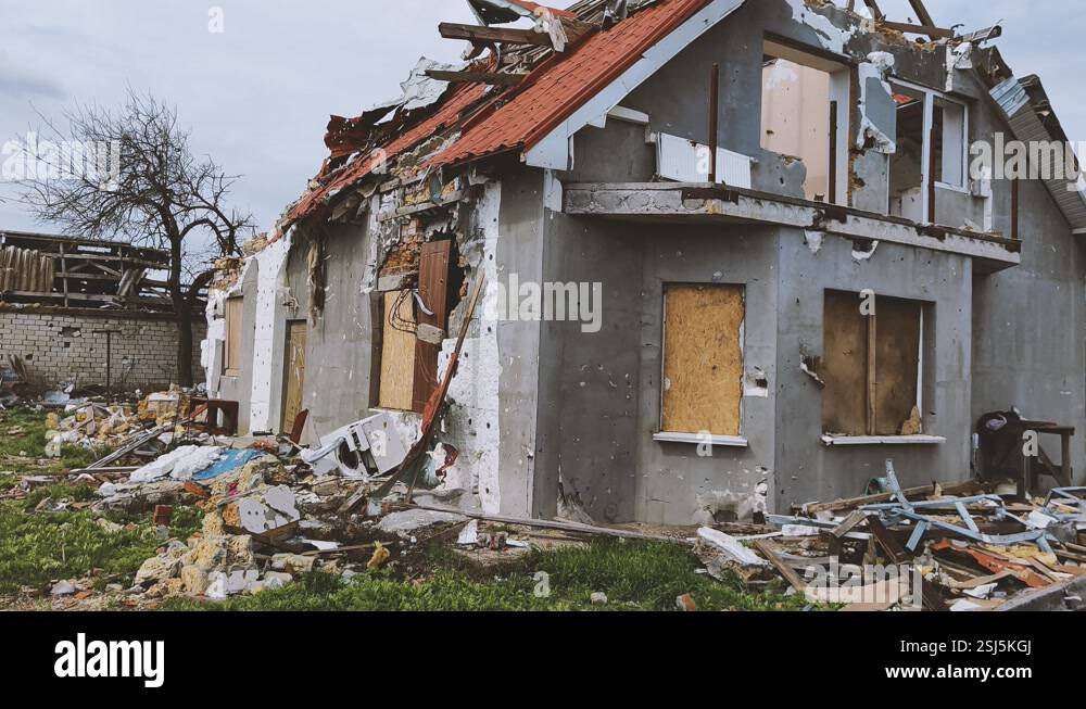 War crime. Civil houses shot down by tanks and destroyed by artillery ...