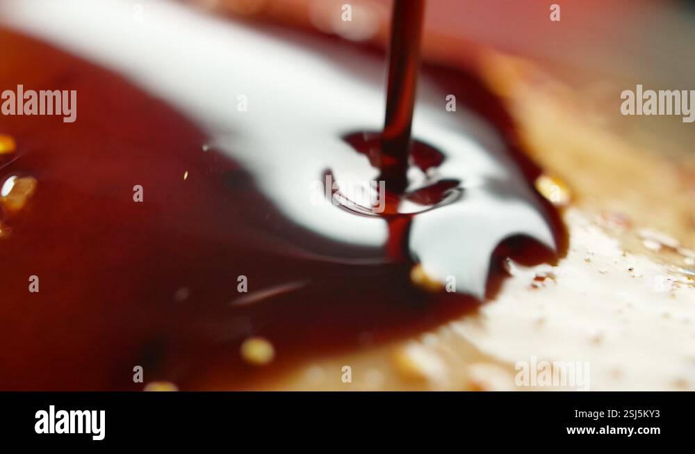 Soy sauce poured over a mixture of spices poured over a raw duck ...