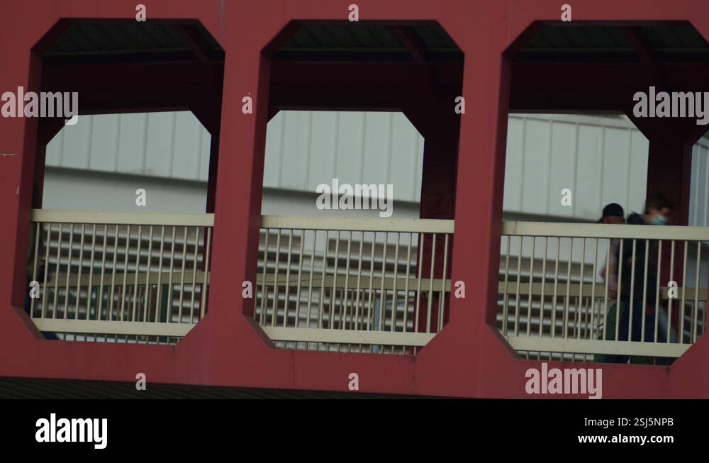 Static timelapse of people walking on a pedestrian bridge in Hong Kong ...