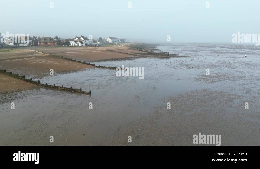 Misty Aerial of Whitstable Beach, over Groynes Stock Video Footage - Alamy