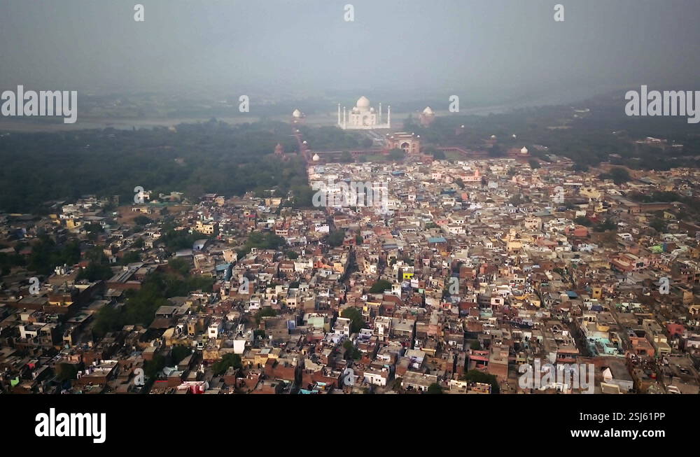 Famous from afar distance of Taj Mahal aerial Arga India rural busy ...