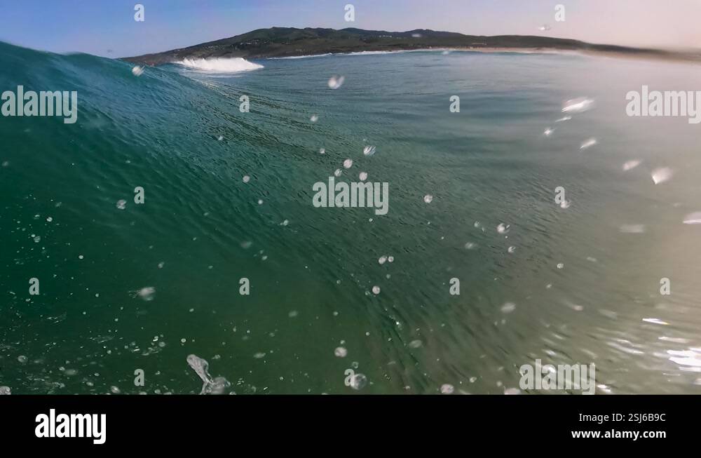 Ocean wave surfing POV. amazing snap on lip. professional surfer with ...