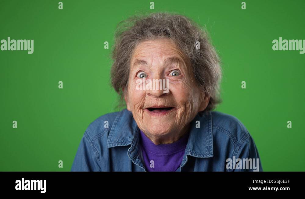 Portrait of toothless elderly senior old woman with wrinkled skin and ...