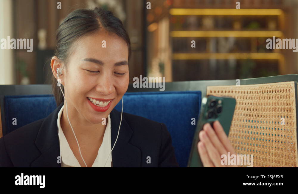 Asia female passenger with suit video call phone show luxury life ...