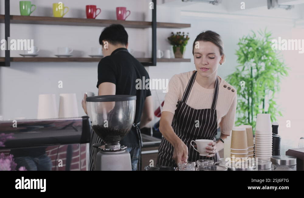 Coffee shop concept of 4k Resolution. employees working together in a ...
