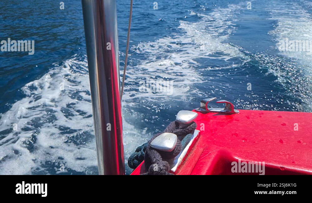Bow and Stern Wave of Red Boat Sailing in Deep Blue Sea, Slow Motion ...