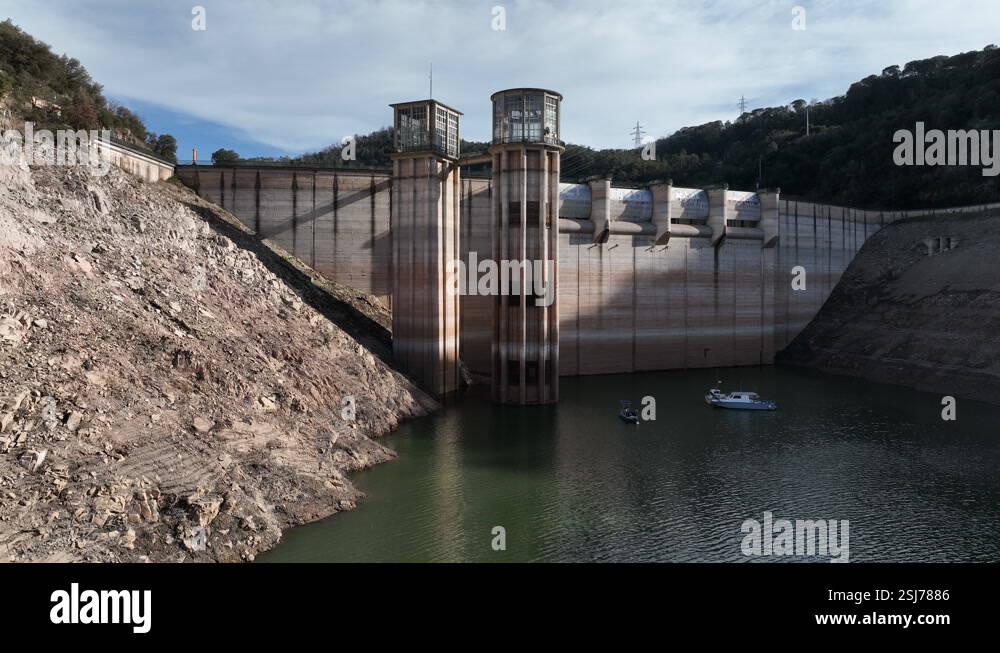 Aerial rising of Sau dam in very low water conditions, Catalonia, Spain ...