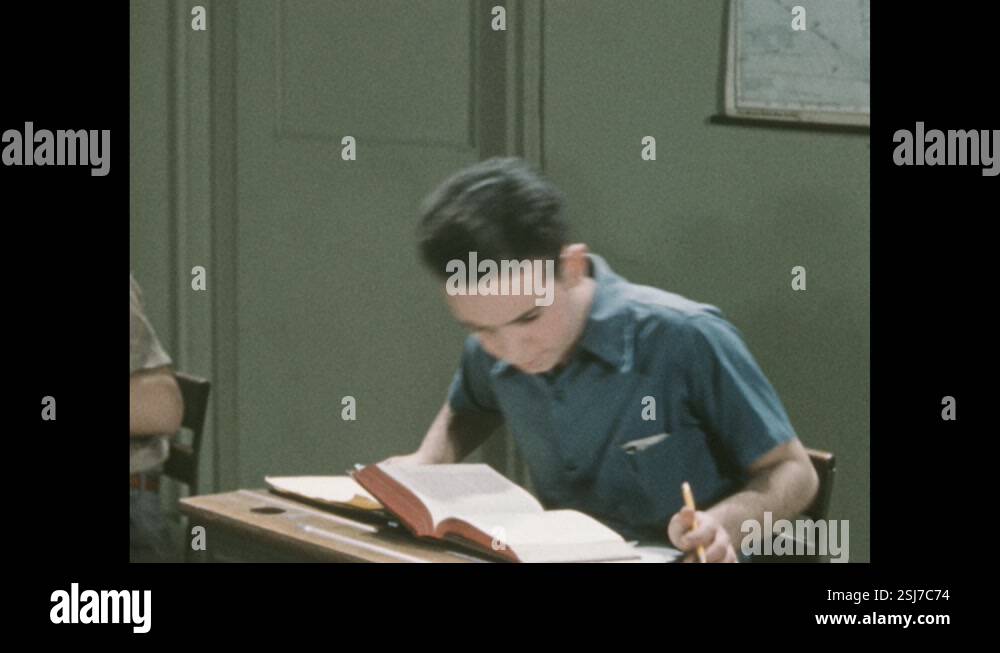 1940s: students at desks working on assignments and reading during ...