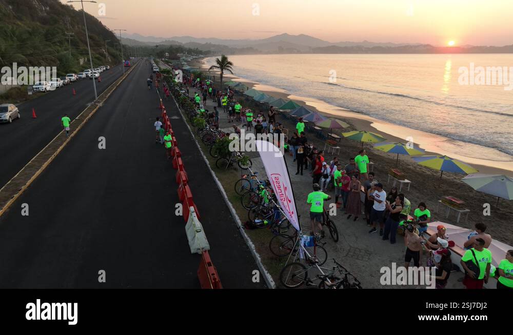 Spectators Clapping And Cheering For Athletes During Race At Triathlon ...