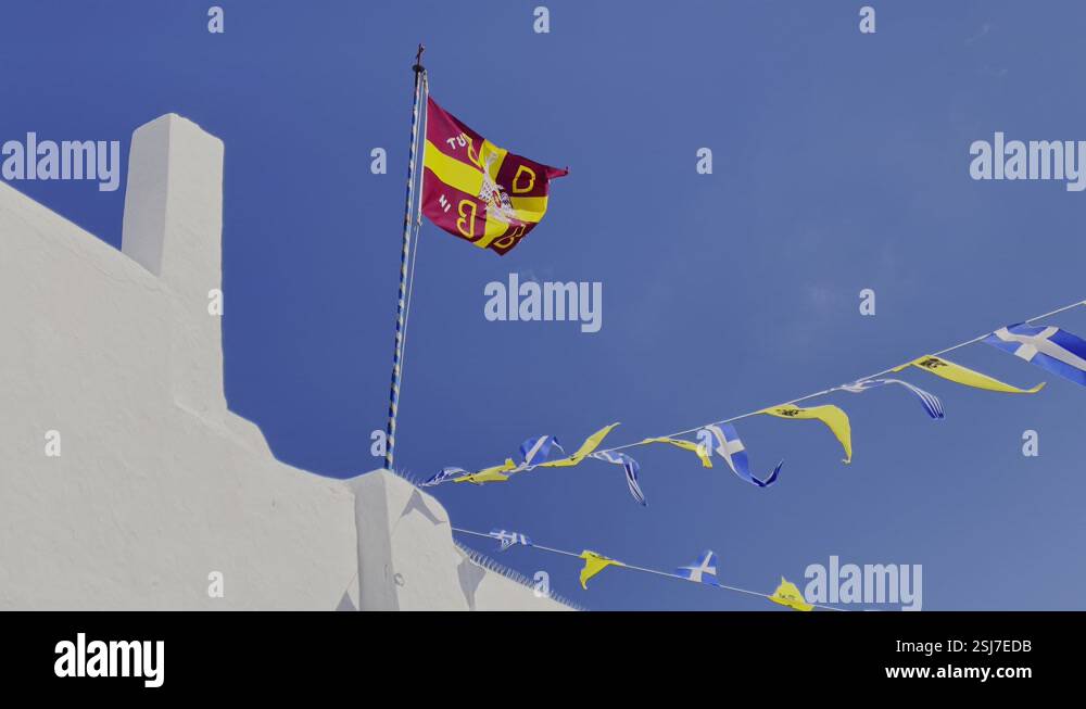Greek orthodox flags waving in slow motion during celebration Stock ...
