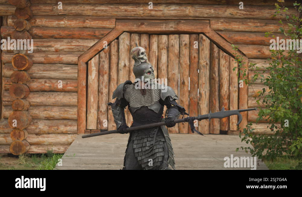 Medieval knight walks down street in ancient village Stock Video ...
