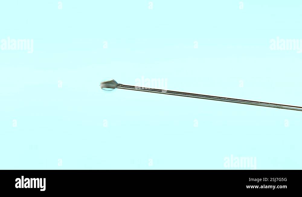 A clear liquid medicine or vaccine for injection drips pours ,asmr ...