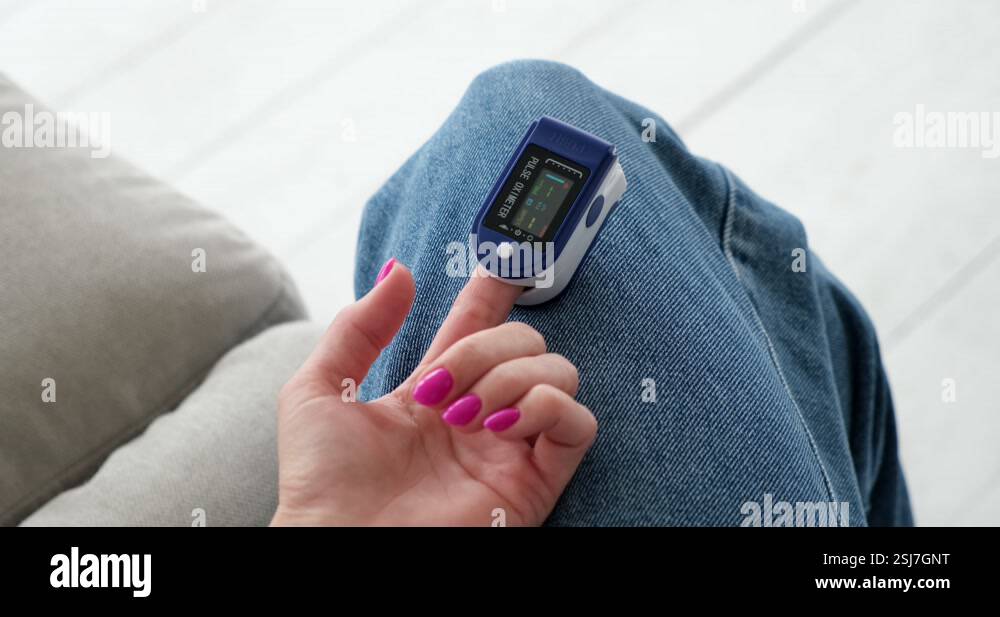 Woman Checks Pulse and Oxygen Levels with a Pulse Oximeter Stock Video ...