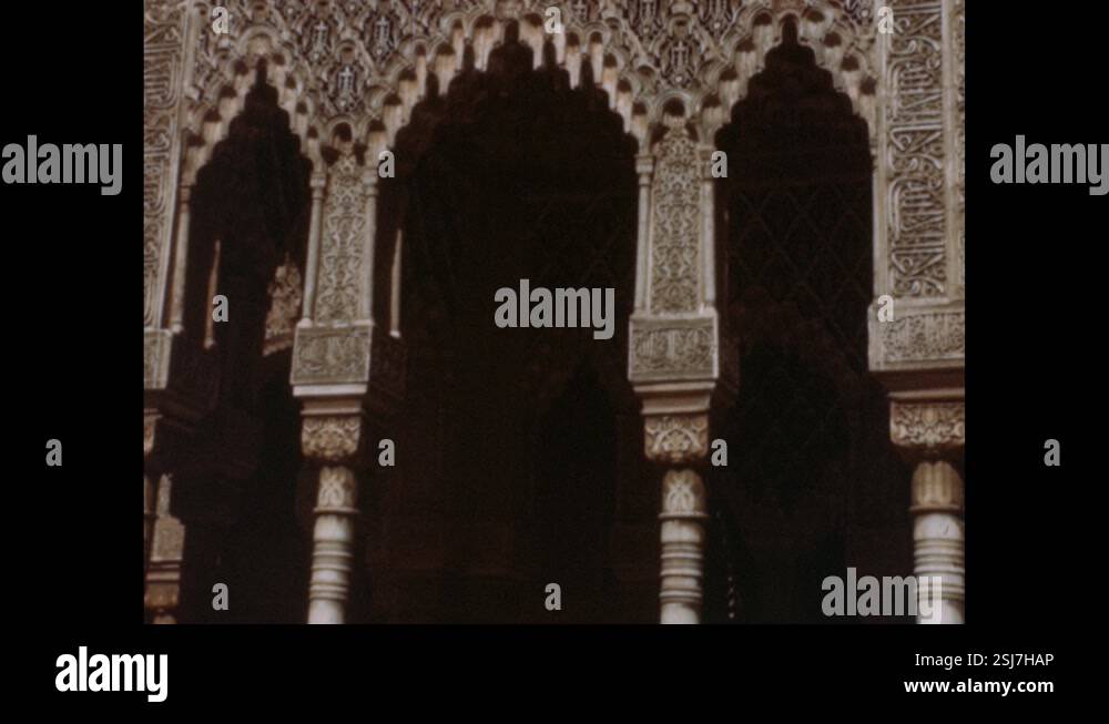 1950s: Curved and scalloped doorways of the Middle East. Ornate columns ...