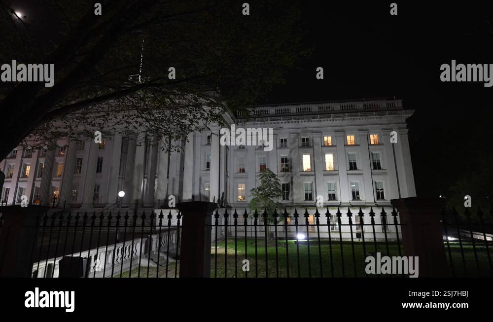 Front facade South side of the US Treasury Department at night with ...