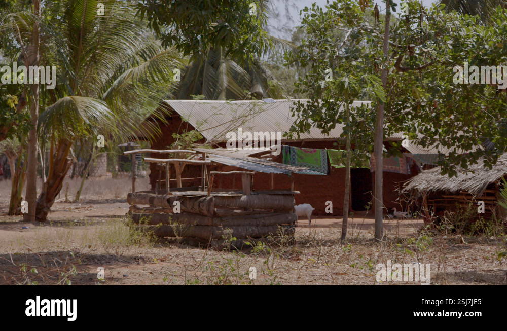 Traditional tribal African village with huts and houses in poverty ...