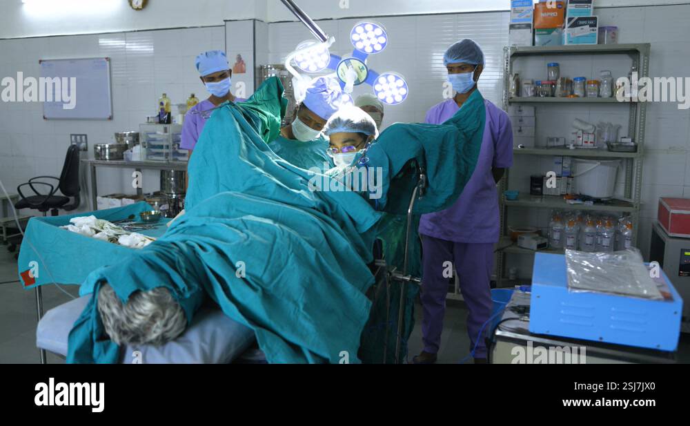 Surgical healthcare medical training team in scrubs working in modern ...