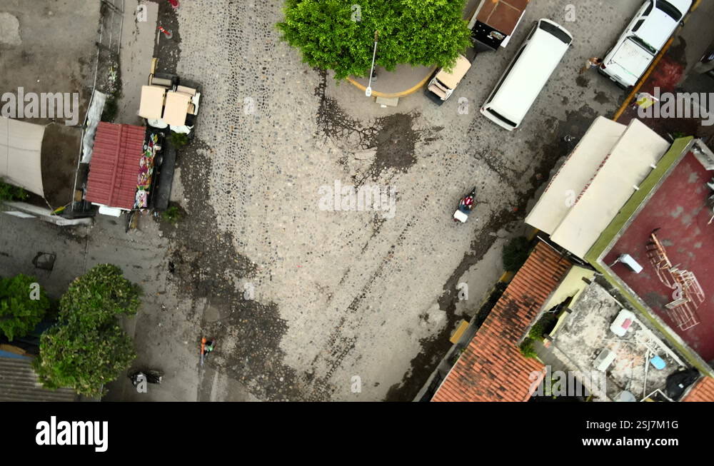 Overhead View Of Cars And Motorcycles Driving In The Street Of Sayulita ...
