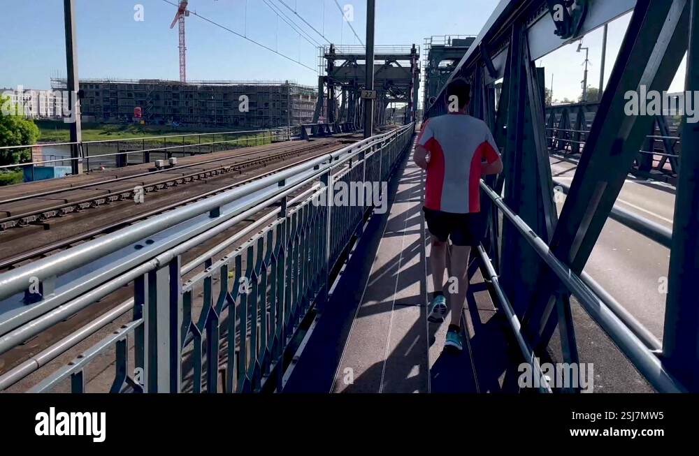 Steady full speed chase and following of male trail runner seen from ...