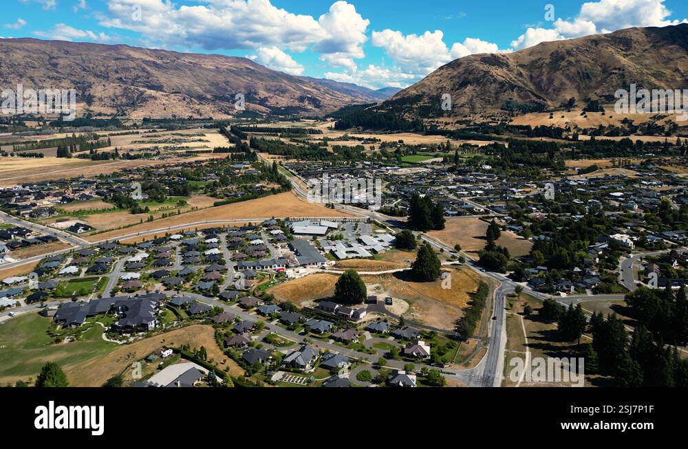 City of Wanaka. Ski and summer destination. New Zealand. Aerial forward ...