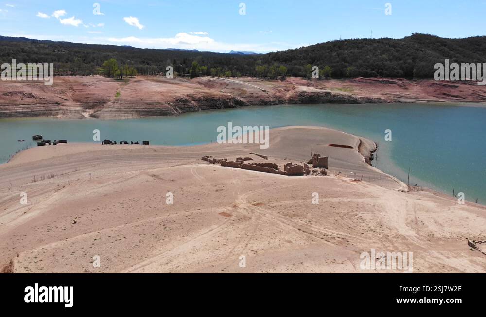 Empty reservoir with ruined houses. Aerial shot Stock Video Footage - Alamy