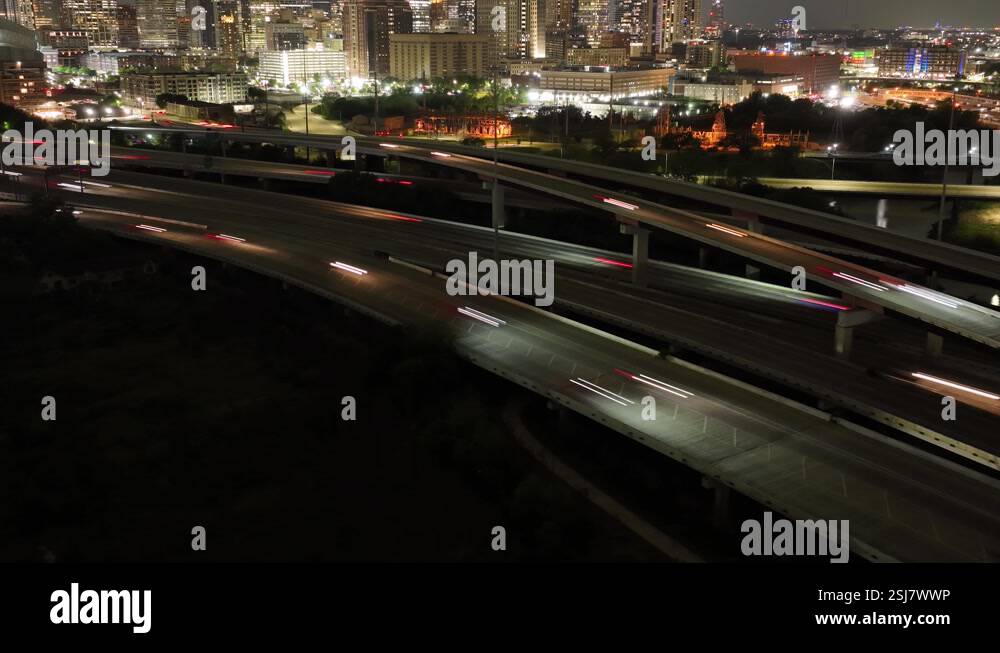 Houston, Texas freeway traffic at night and skyline Timelapse with ...