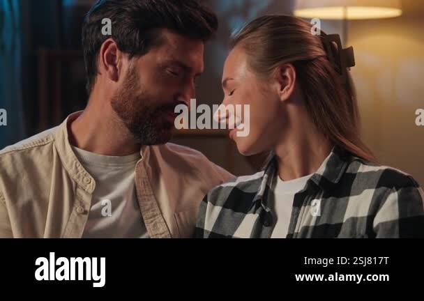 Happy Caucasian romantic couple cuddling foreheads touch smiling feel ...