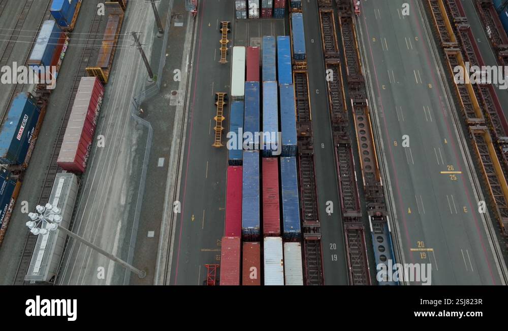 Top down view of trains being loaded in Seattle's downtown shipyard ...