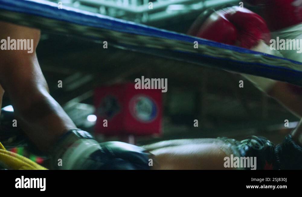 4K Cinematic slow motion footage of two young Thai men fighters on a ...
