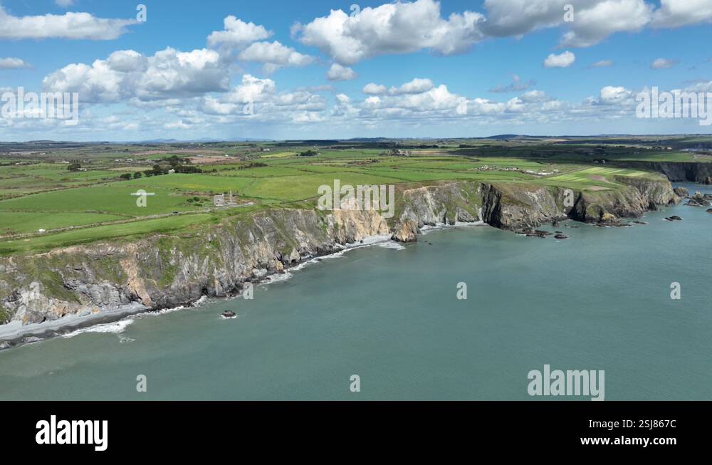 Ireland coast Waterford Copper Coast flying to the high sea cliffs at ...