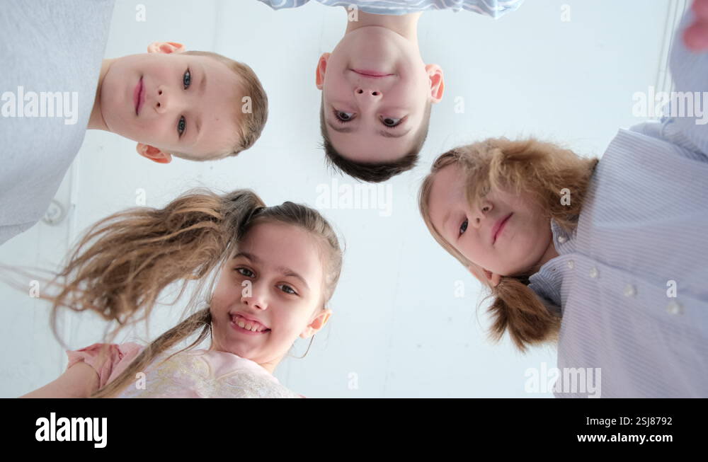 Kids Standing Together in Circle Looking at the Camera Stock Video ...