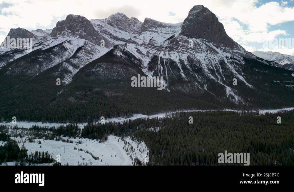 Aerial view of snowy mountains and river, Canmore, Alberta, Canada ...