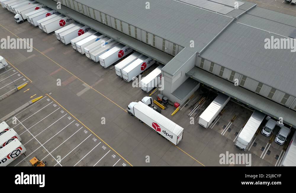 Aerial view of a DPD logistics and transport yard in the UK with lots ...
