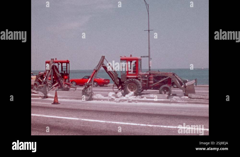 1970s: Packages on conveyor belt, hands packing box. Construction ...