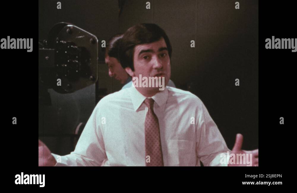 1980s: Man stands in an animation studio and speaks to the camera as an ...