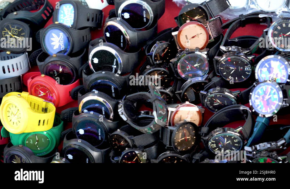 Colorful watches at display at a street stall, Mumbai, India Stock ...