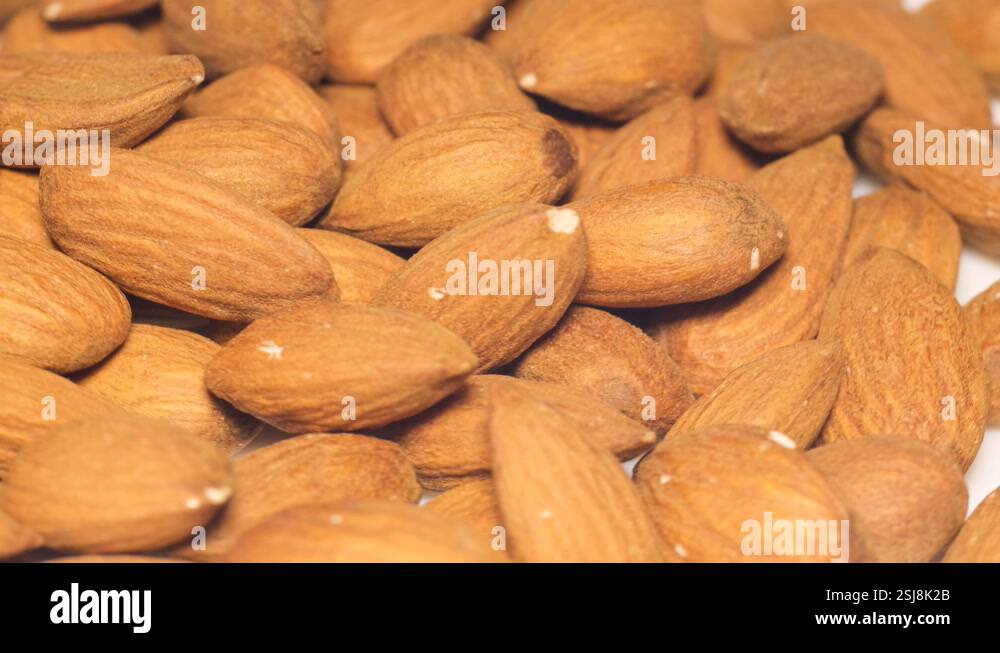 Light brown almond nuts with a thin skin. Nuts have a sweet nutty taste ...