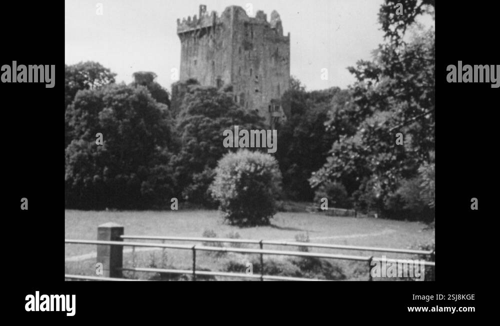 1940s: round tower with conical roof near ruined stone wall, castle ...