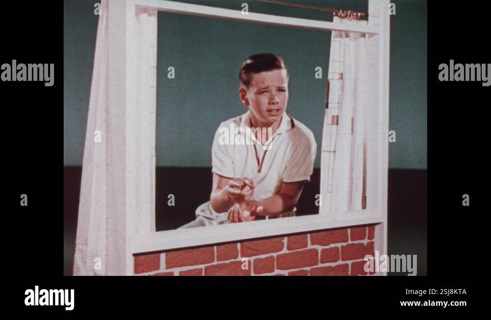 1950s: Girl at her window asking a question. Boy at the window answering. Boys Stock Video ...