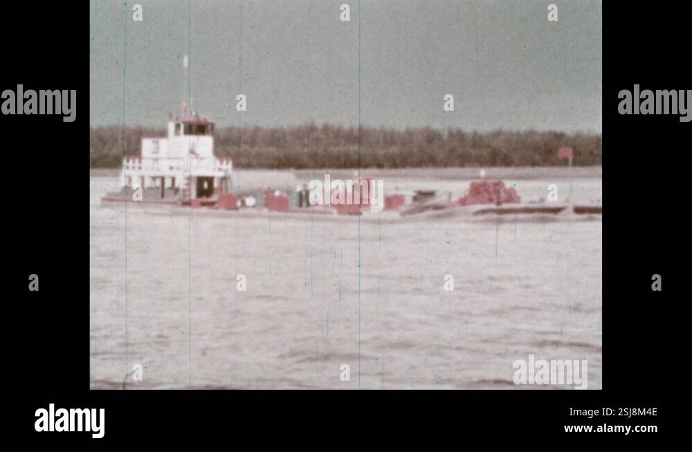 1960s: Tugboat pushes barges. Lines and locations appear on animated ...