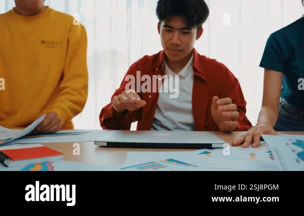 Excited and happy startup company employee celebrate and throw paper in ...