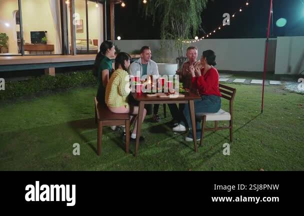 Family gather celebrate holiday. Parents, grandparents and girl ...