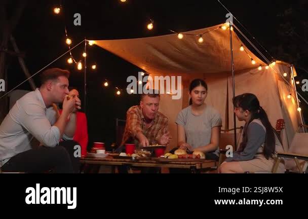 Family together celebrate holiday in garden. Family member gathering ...