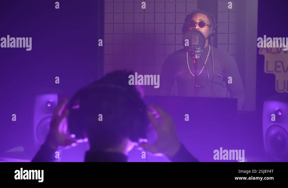 professional soul music and rap performer is recording new track in ...